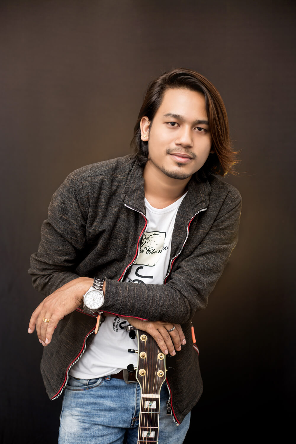 Suraj Bhujel singer & song writter originally from Dharn